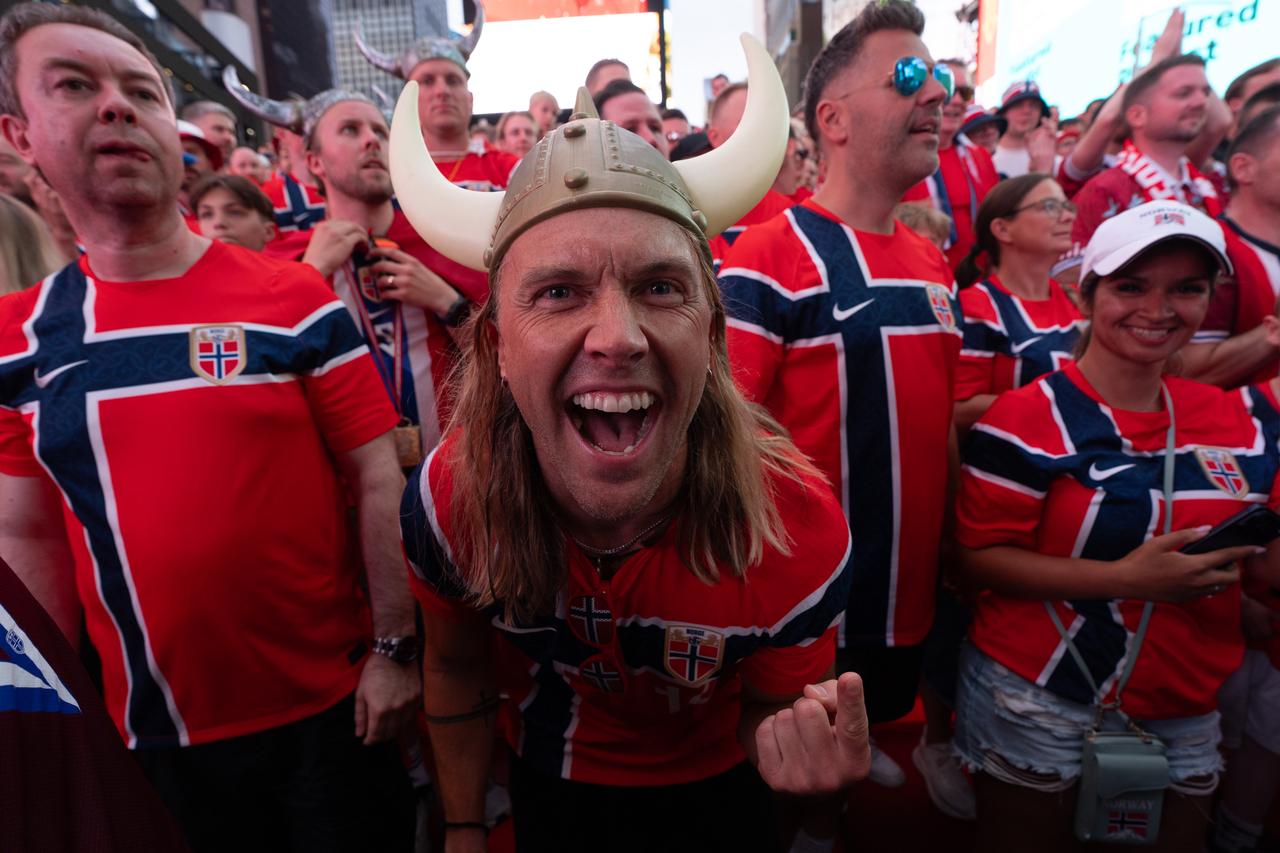 Norwegian fans bring Viking rowing chant to Times Square during World ...